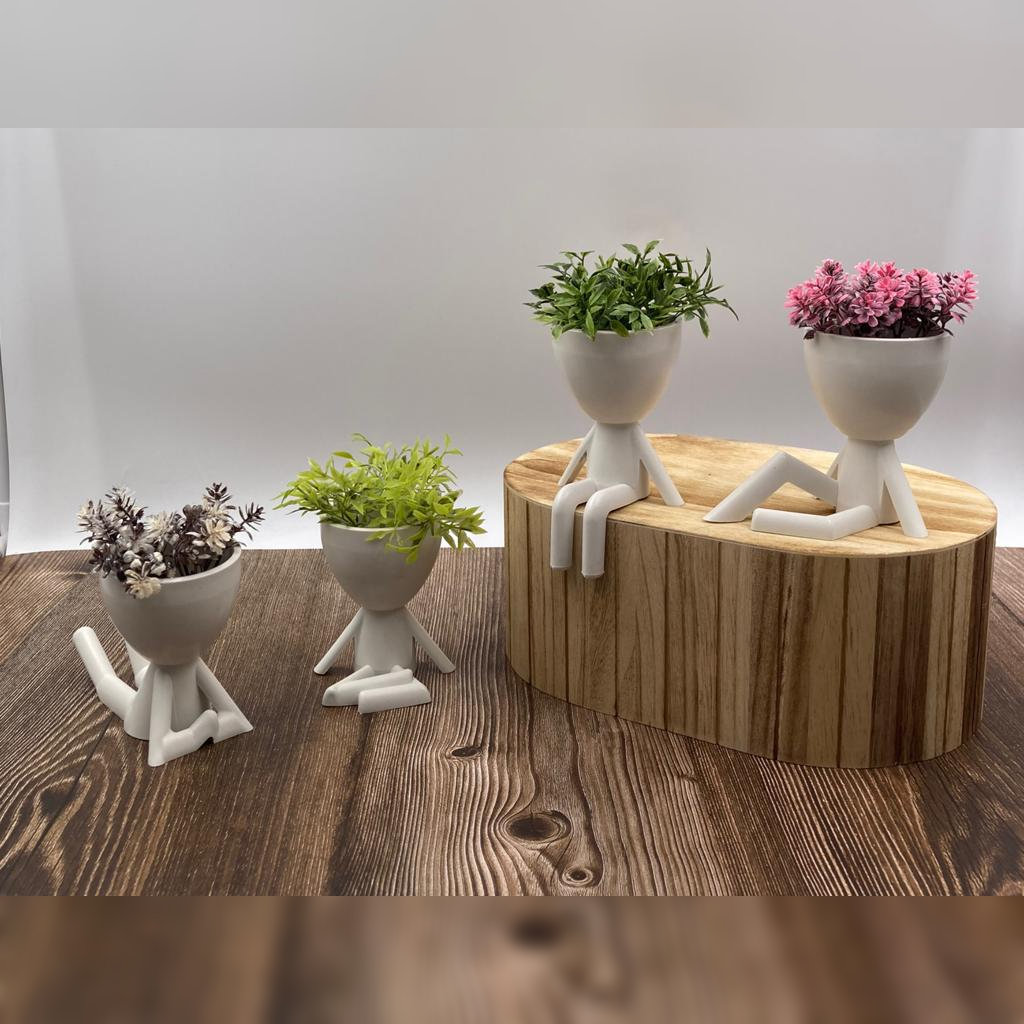 Playful Mini Humans Flower Pot with Flowers